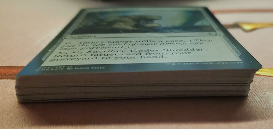 如何修复弯曲的闪卡 | PTCG.cn 卡牌网